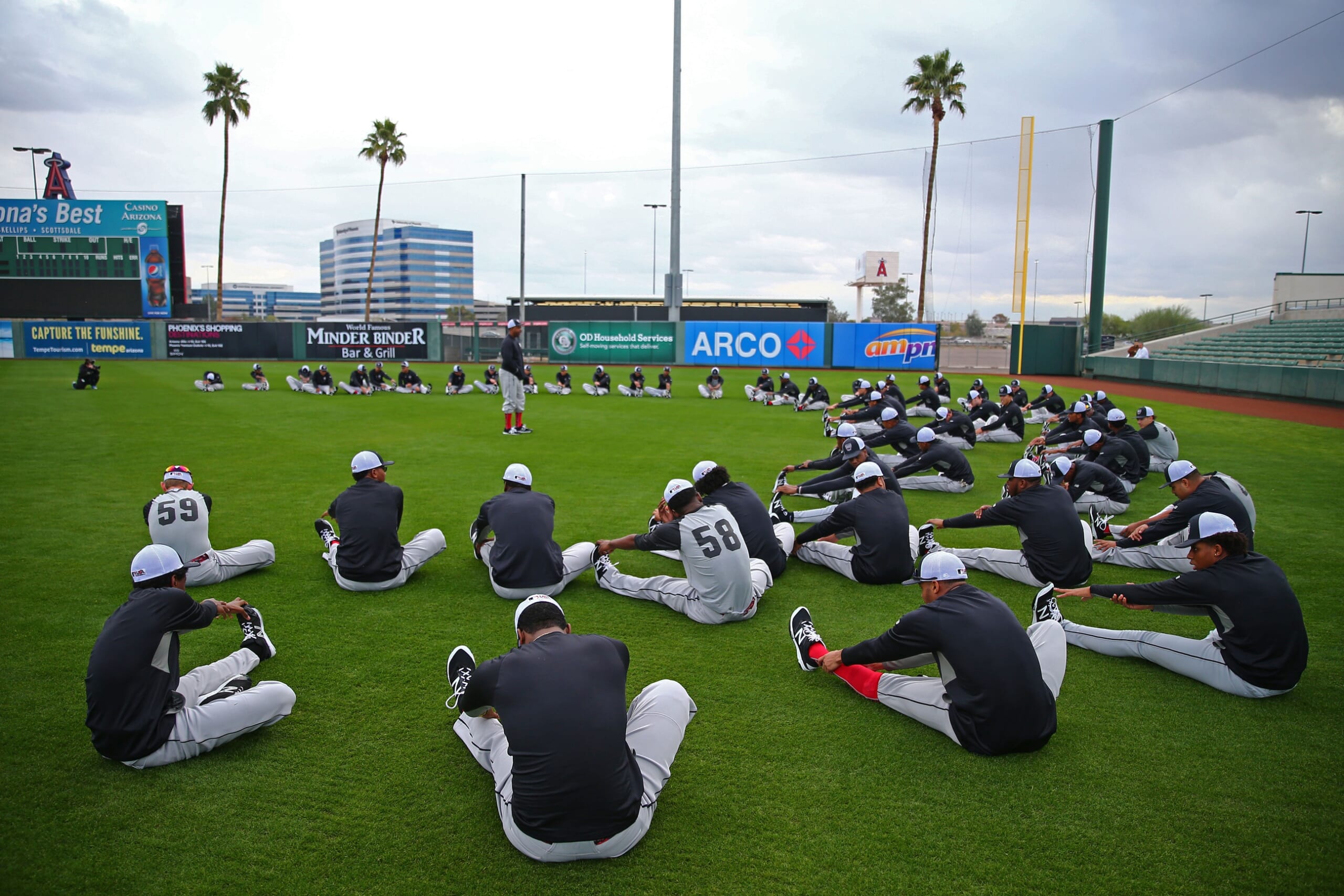 Baseball coach on leave after setting field on fire